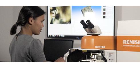 Renishaw applications scientist using a Raman microscope