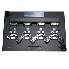 Custom fixture using Spring loaded clamps to hold four parts in two ...